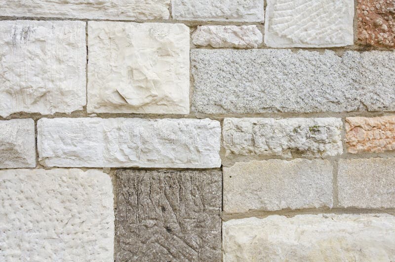 Wall Made of Stone and Marble Blocks of Different Texture Stock Photo ...
