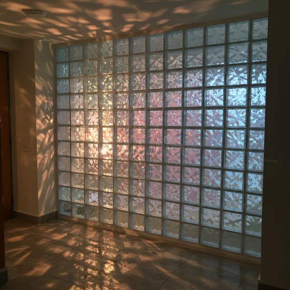 A Wall Made of Translucent Glass Blocks Forms a Partition, Allowing ...