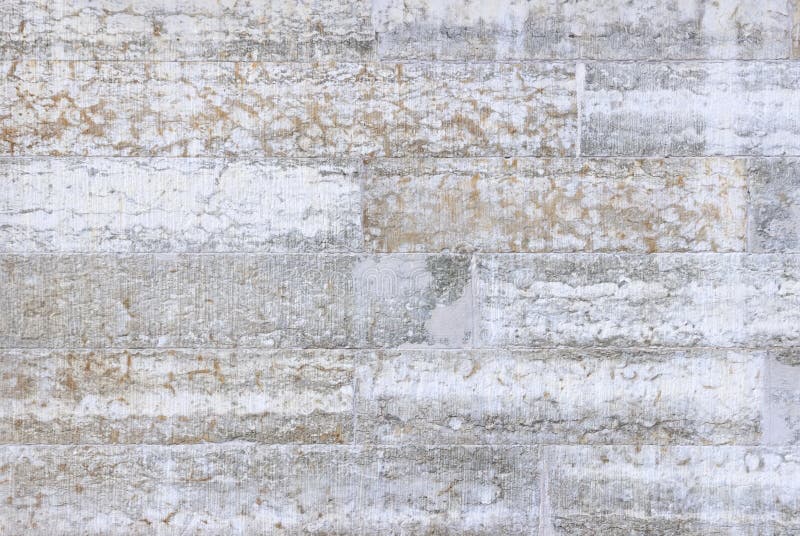 The Wall is Made of Yellowish Blocks of Hewn Limestone. Stock Image ...