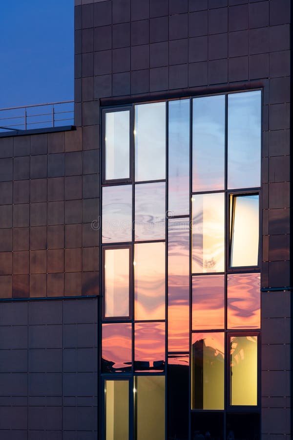 Wall of a Modern Building. Sunset Reflection in the Window Stock Image ...