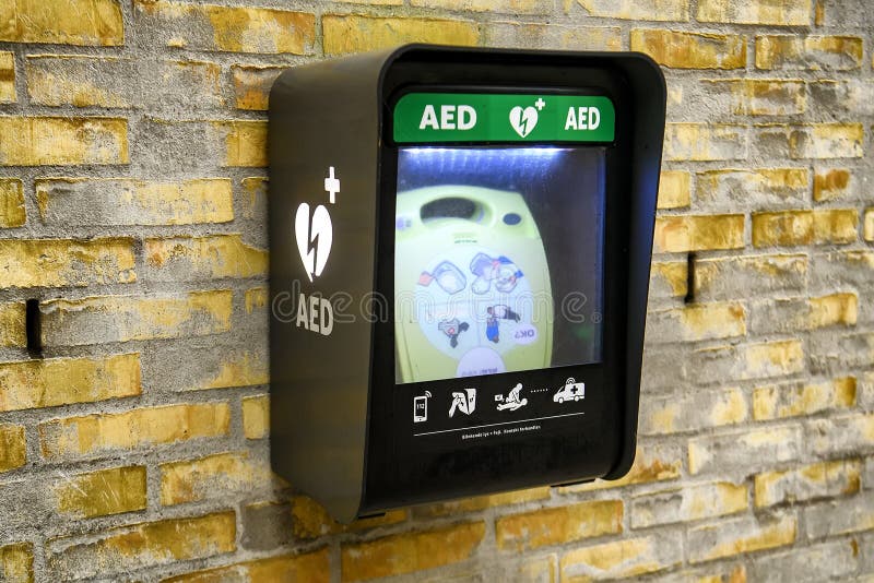Wall Mounted AED Defibrillator in a Public Place Editorial Stock Image ...