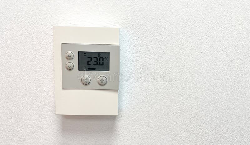 Wall-Mounted Air Conditioner Thermostat Displaying Room Temperature 23 ...