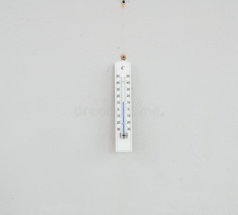 Wall-Mounted Celsius Thermometer Displaying Temperature on White ...