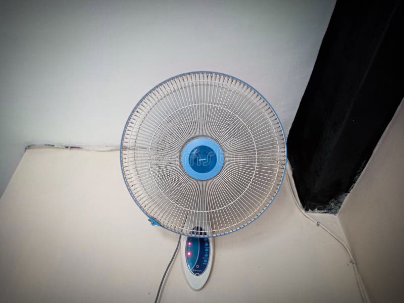 Wall mounted fan stock image. Image of wheel, blue, interior - 274611055