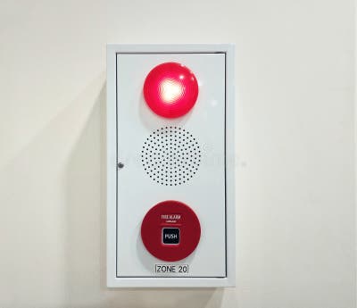 A Fire Alarm Panel in White Color with Red Indicator Light a Buzzer or ...