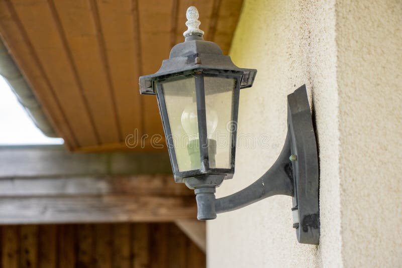 Wall-mounted Lamp Covered with Dust Stock Photo - Image of dust, energy ...