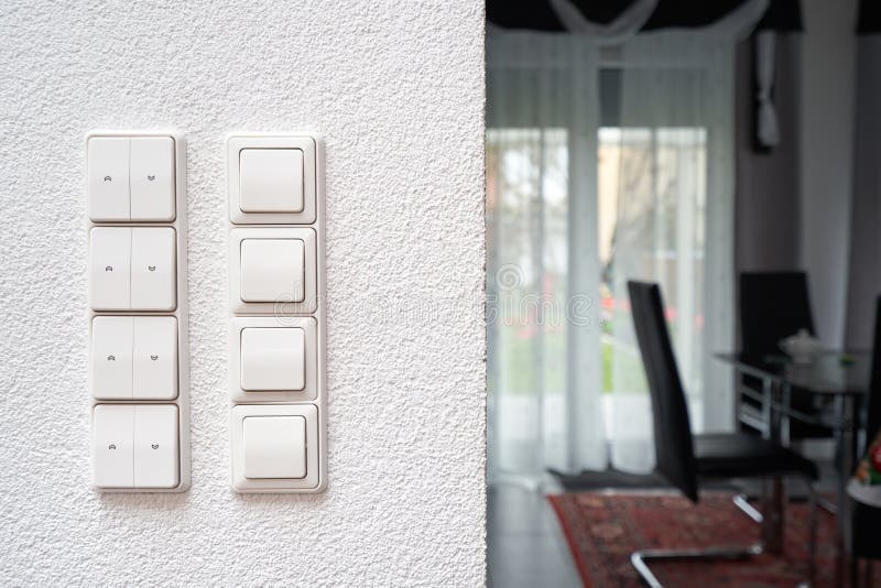 A Lot Wall-mounted Light Switches and Roller Shutter Control Switch on ...