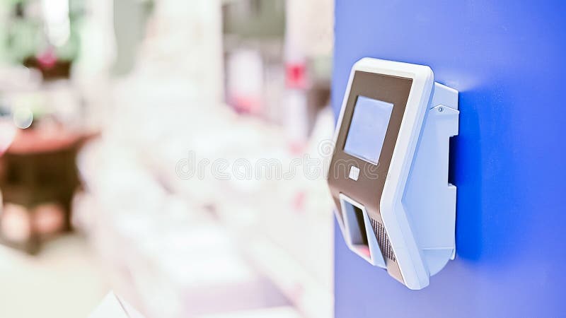 Wall Mounted Price Scanner on a Blue Wall Stock Image - Image of ...