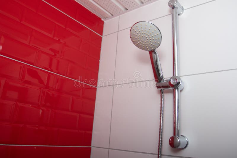 Wall-mounted Shower in the Bathroom with Red Tiles Stock Image - Image ...