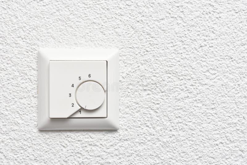 Wall-mounted Temperature Controller with Adjustment Wheel, Close-up ...