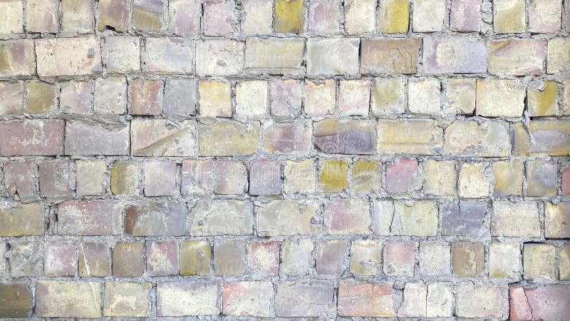 A Wall of Multicolored Bricks of Different Sizes. the Construction ...