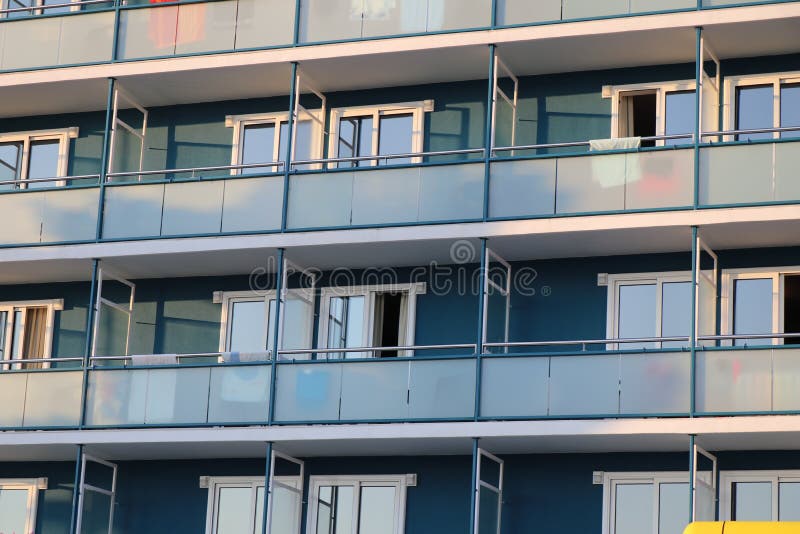 Wall with Multiple Windows and Balconies Stock Photo - Image of built ...