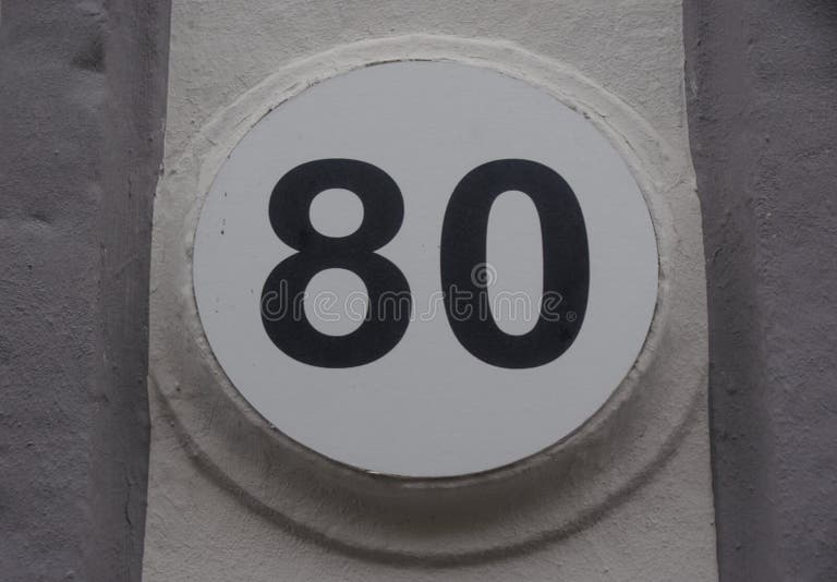 A Wall with the Number Eighty Stock Photo - Image of metal, house ...
