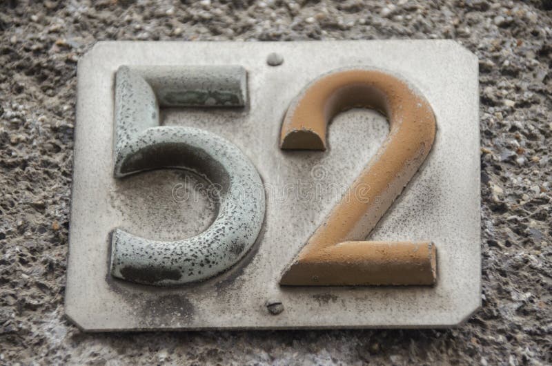 A Wall with the Number Five-two Stock Photo - Image of circle, digits ...