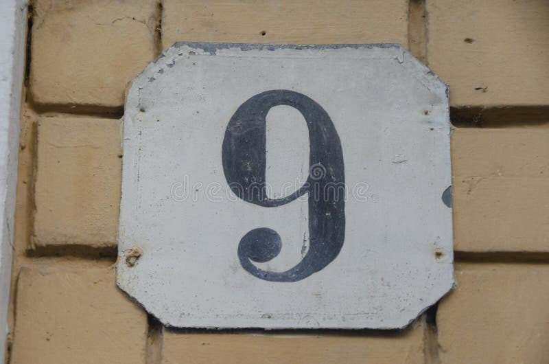 Wall with the number nine stock photo. Image of figure - 230553940