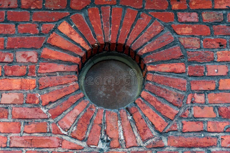 Wall of an Old Brick Building and Round Window Stock Photo - Image of ...