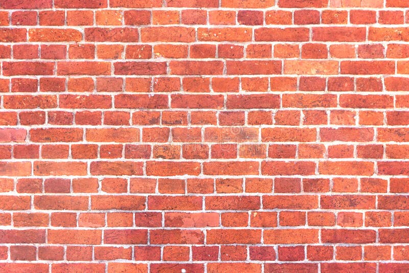 A Wall of Old, Cracked Bricks, with a Weathered and Faded Surface ...