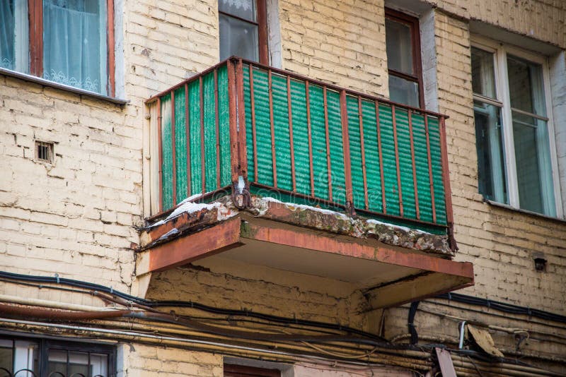 Wall of an Old High-rise Building with Orange Balconies Stock Photo ...