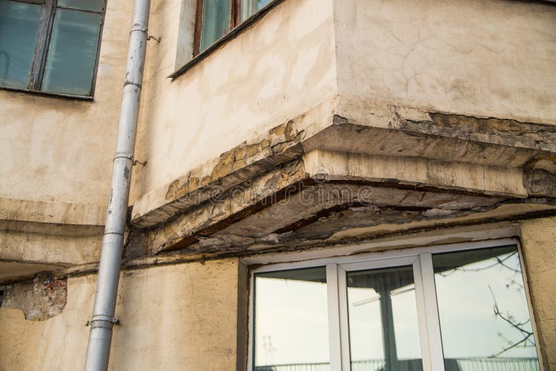 Wall of an Old High-rise Building with Orange Balconies Stock Photo ...