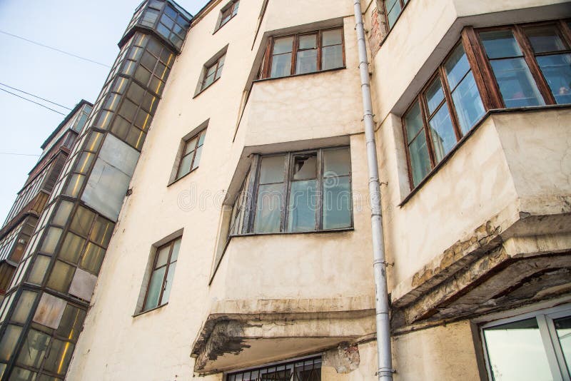 Wall of an Old High-rise Building with Orange Balconies Stock Photo ...