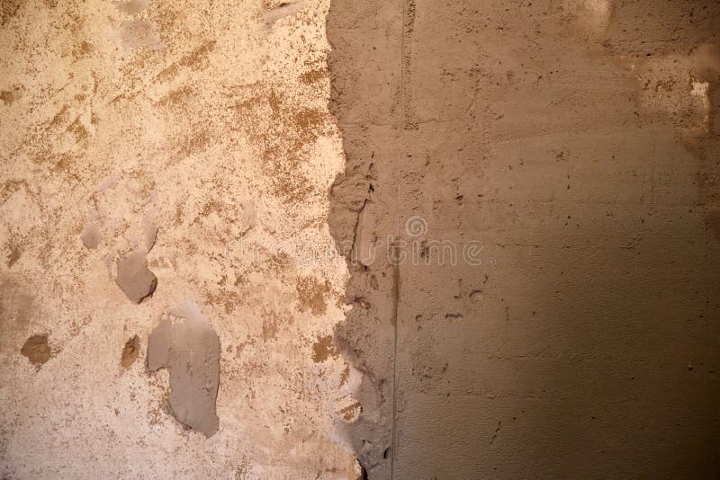 A Wall with the Old Plaster Removed and a Layer of New Plaster. Stock ...