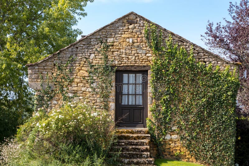 Wall of a Old Stone House Overgrown with Ivy. Stock Image - Image of ...