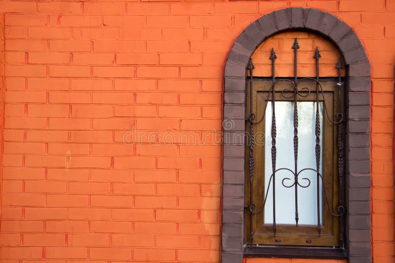 Wall of Orange Brick and Vintage Window. Stock Photo - Image of ...