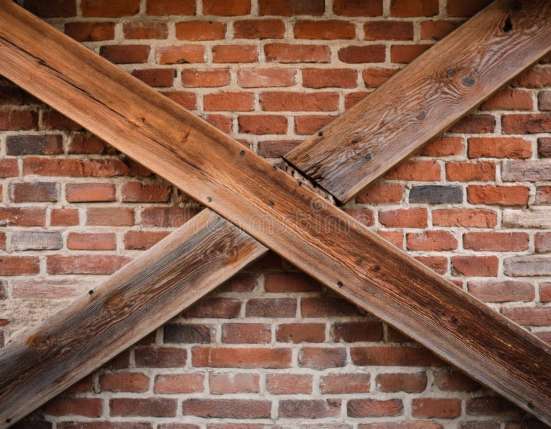 A Wall Panel of Exposed Bricks Paired with Wooden Beams To Showcase Classic Urban Construction ...