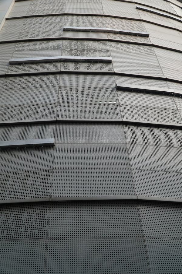 Wall of Perforated Steel Buildings in View Stock Image - Image of ...