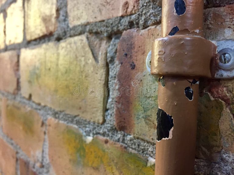 Metal Water Pipe on Brick Wall Stock Photo - Image of brickwall ...