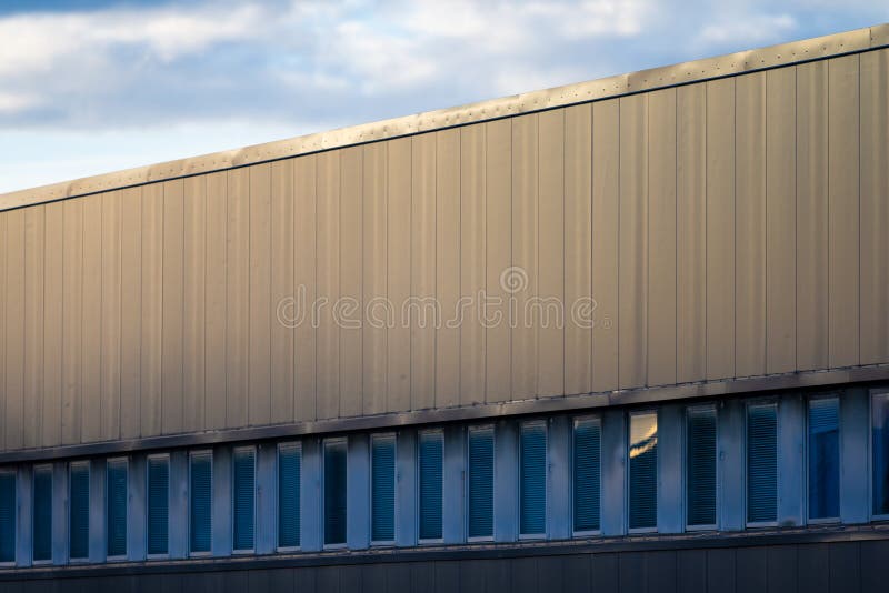 Wall Plates Above Windows of a Large Warehouse.. Stock Photo - Image of ...