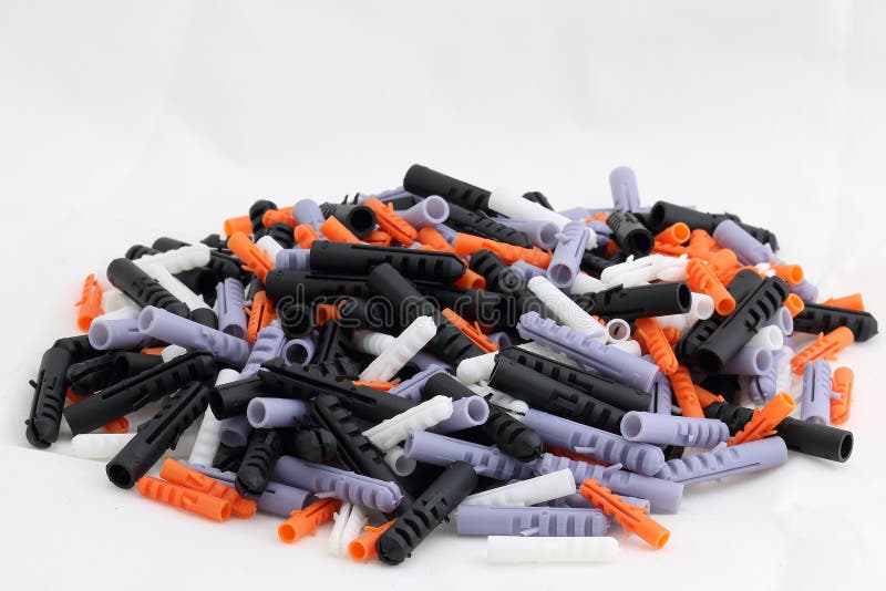 Wall Plug in Different Colors and Sizes on One Pile Stock Photo - Image ...