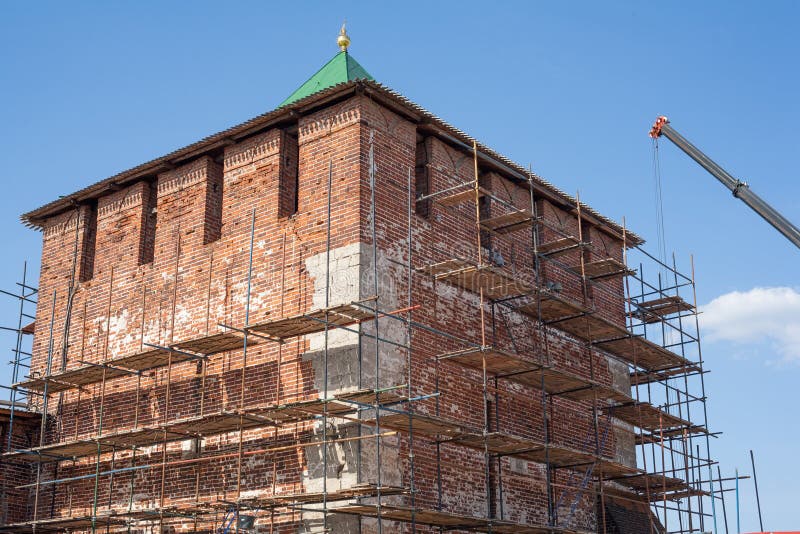 The Wall is Red Brick with a Belt of Limestone Blocks Covered with Moss ...