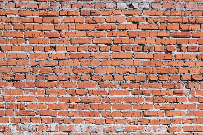 Wall of Red Brick. the Bricks Cracked. Masonry is Uneven. Stock Image ...