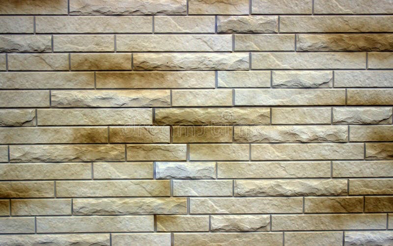 Wall of Relief and Smooth Bricks of Light Brown Color Stock Photo ...