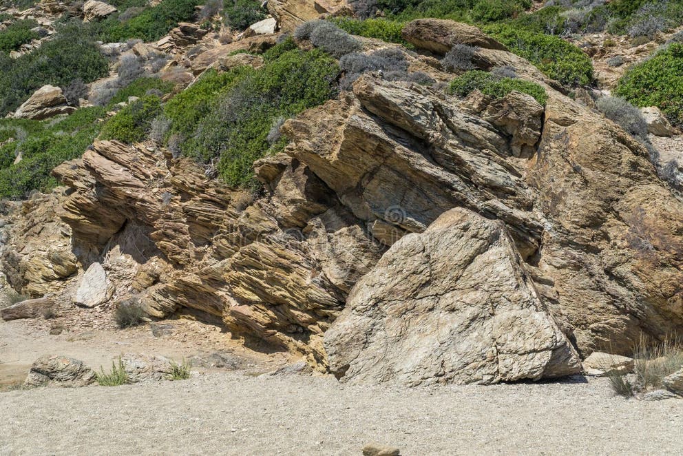 Rockwall stock photo. Image of greece, tropical, rocks - 99911884