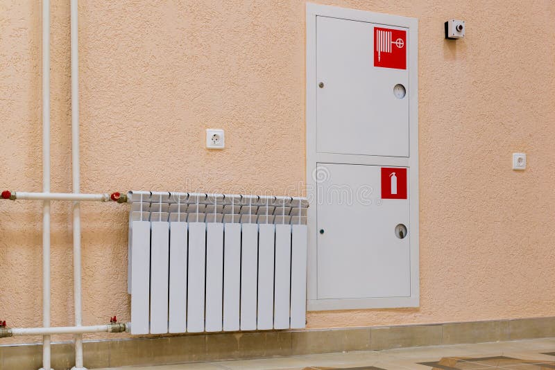 Wall of Room with a Sink, Fire Hydrant and Extinguisher Stock Image ...