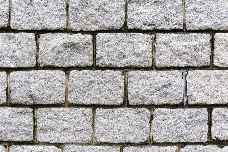 Wall of rough stone tiles stock image. Image of floor - 99519381