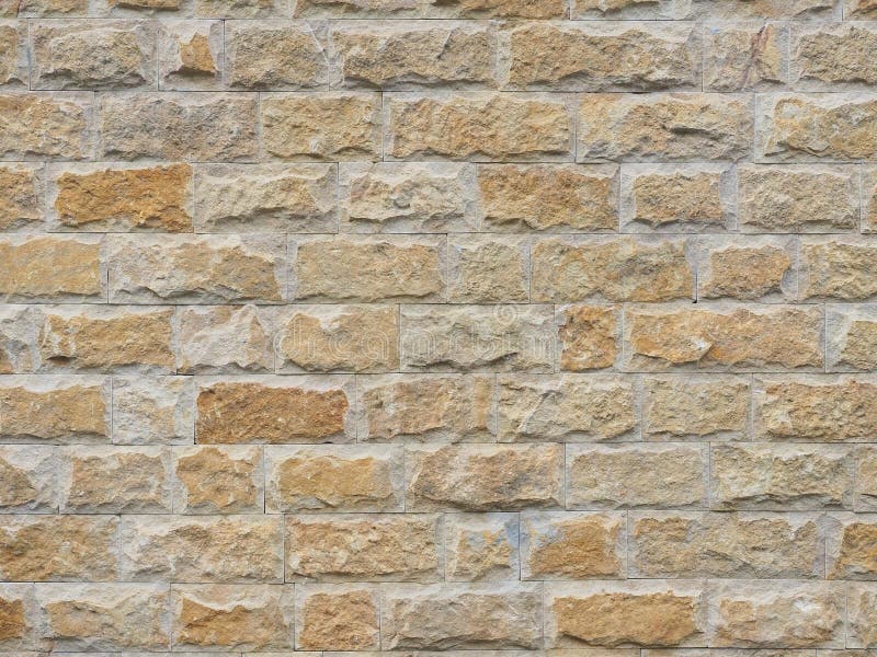 Wall with a Rough Textured Cladding of Beige Red Rectangular Tiles. Not ...