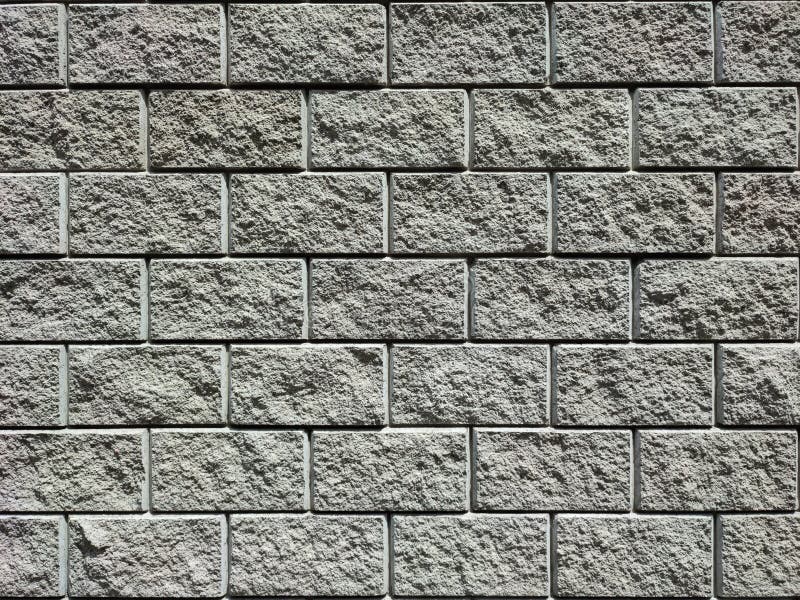 A Wall of Rough Textured Stone Blocks Stock Photo - Image of brick ...