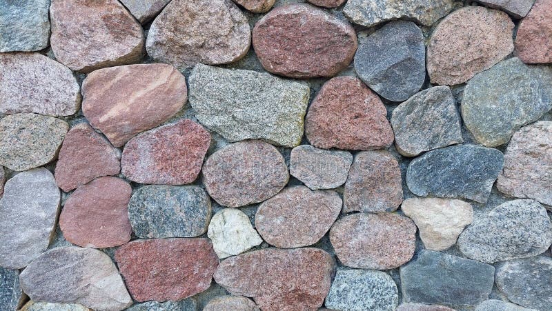 Wall of Round Shaped Granite Blocks Cut in Halves Stock Image - Image ...