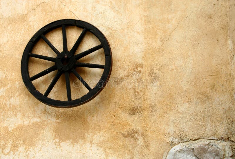 Antique Wooden Wagon Wheel on Rustic White Background Stock Photo ...
