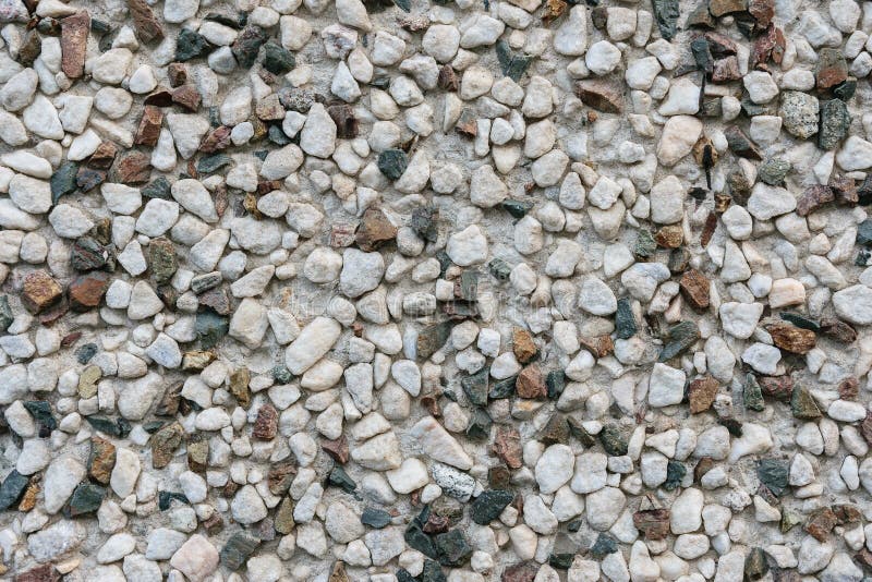 Wall with small stones. stock photo. Image of stone - 108030938