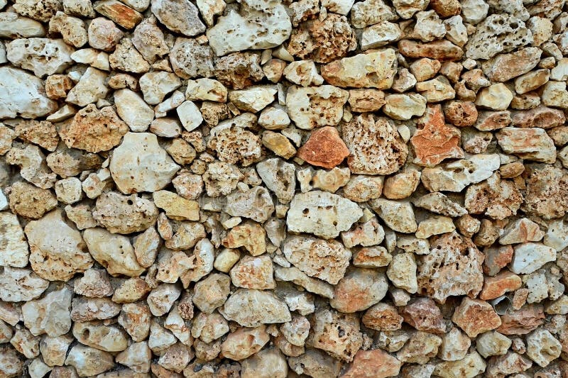 A Wall of Small Stones. the Texture of Light Sandstone Stock Image ...