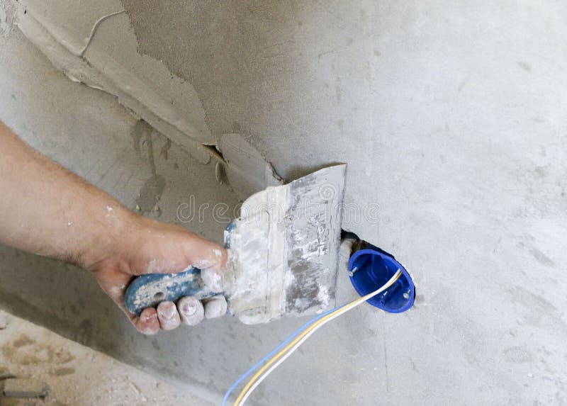 Wall Socket Installation.Work on Installing Electrical Outlets ...