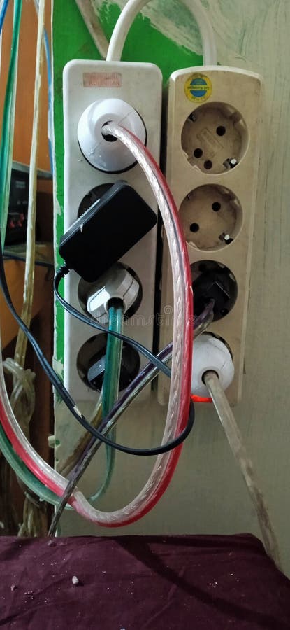 Wall Socket in the Room. Power Plug with Wire in Socket Still Stuck ...