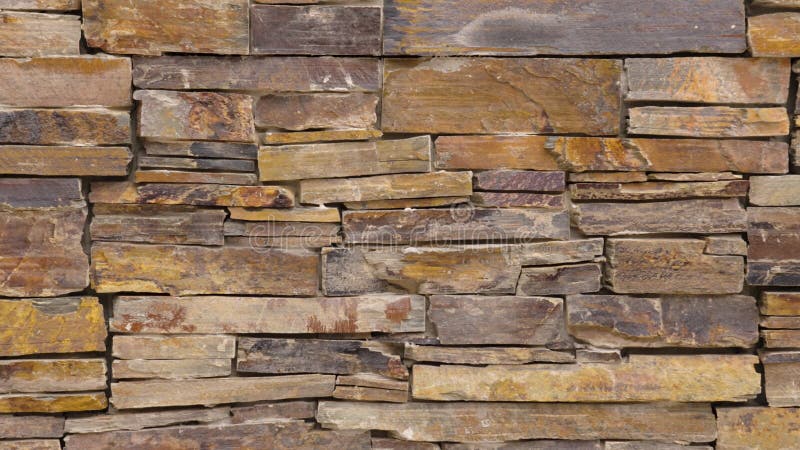Wall of Stacked Thin Natural Stones. Ledgestone Decorative Cladding ...