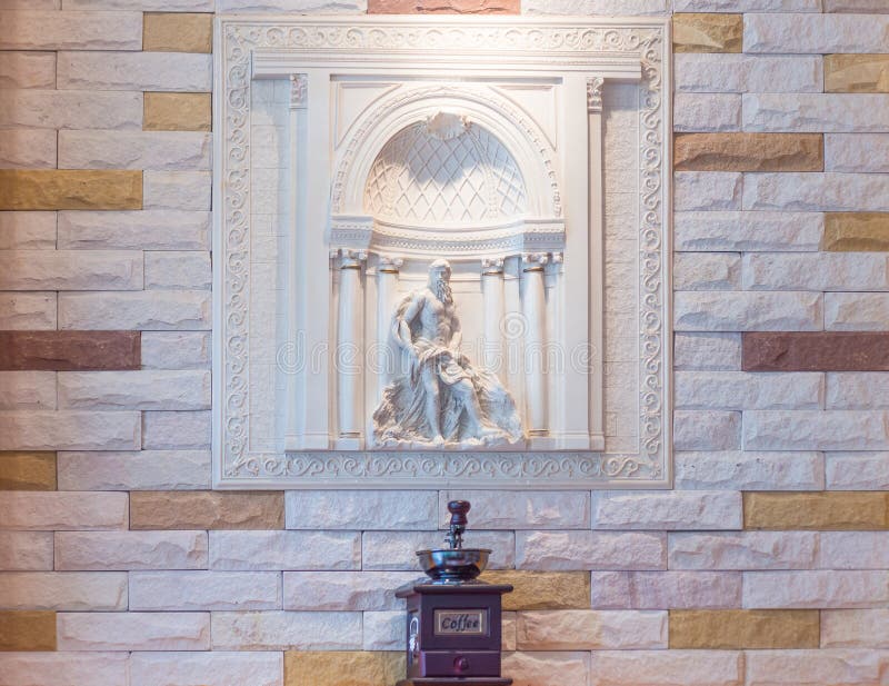 Wall Statue and Coffee Grinder in the Coffee Shop Stock Image - Image ...