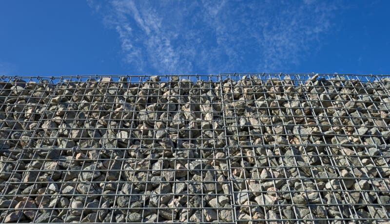 Wall of steel and stones stock photo. Image of steel - 77841510