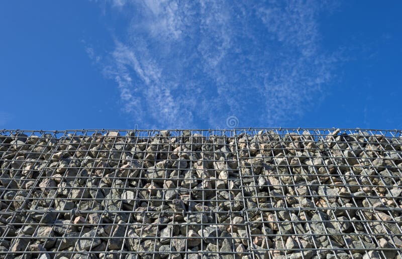 Wall of steel and stones stock photo. Image of fall, grill - 77841592